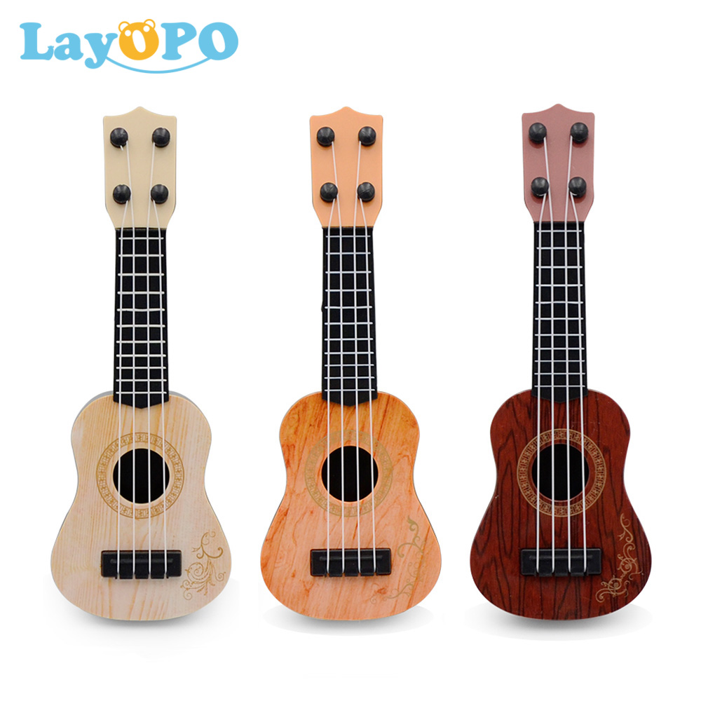 【Yibei Fairy Tale Toy City】Mini Guitar 4 Classical Ukulele Guitar Toy ...