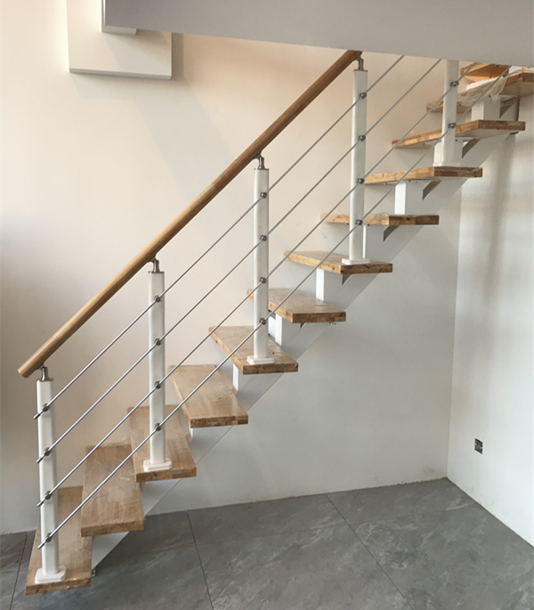 Custom-made steel and wood stairs in loft duplex building Indoor ...