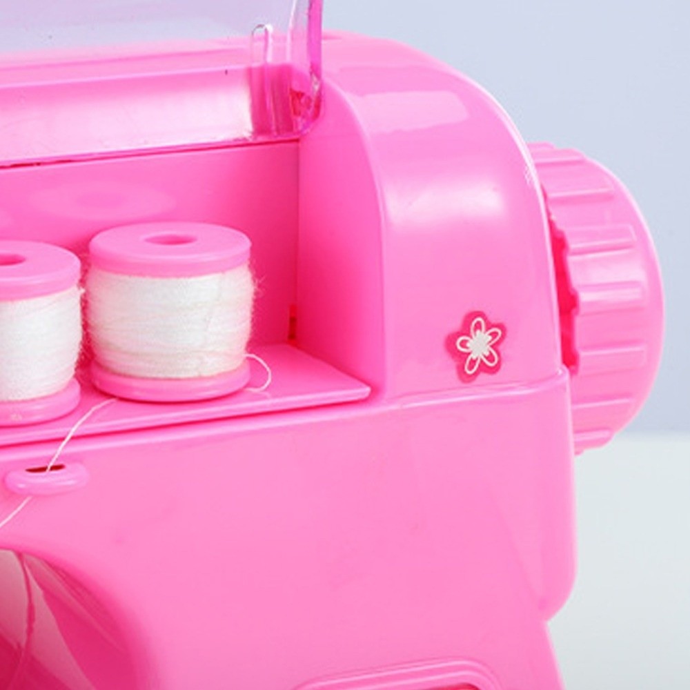 Small Simulated Children Sewing Machine Making Clothes with Light ...