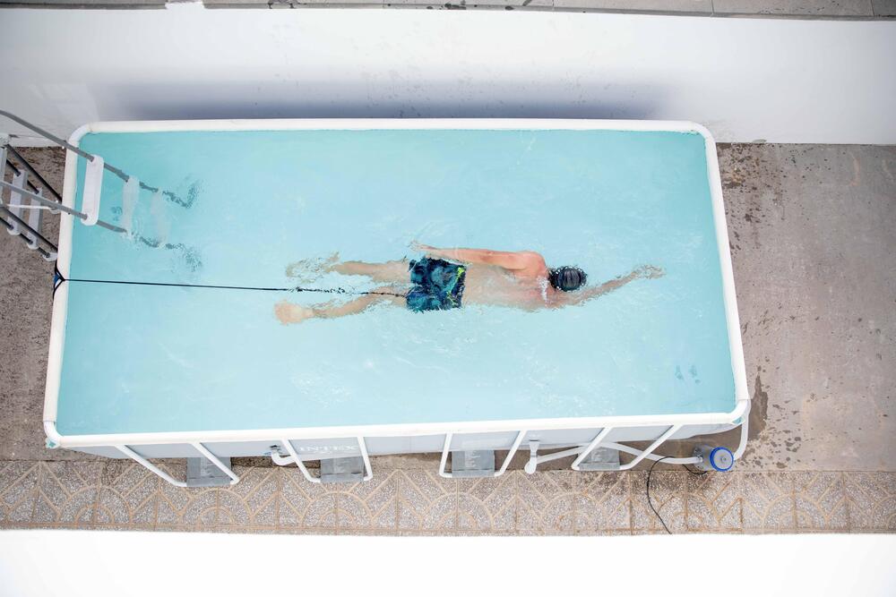 Adult swimming attachment for swimming pool. Stationary position ...